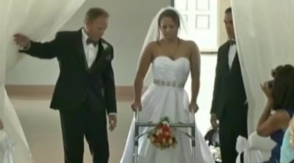 Dream comes true as paralyzed bride walks down the aisle | khou.com