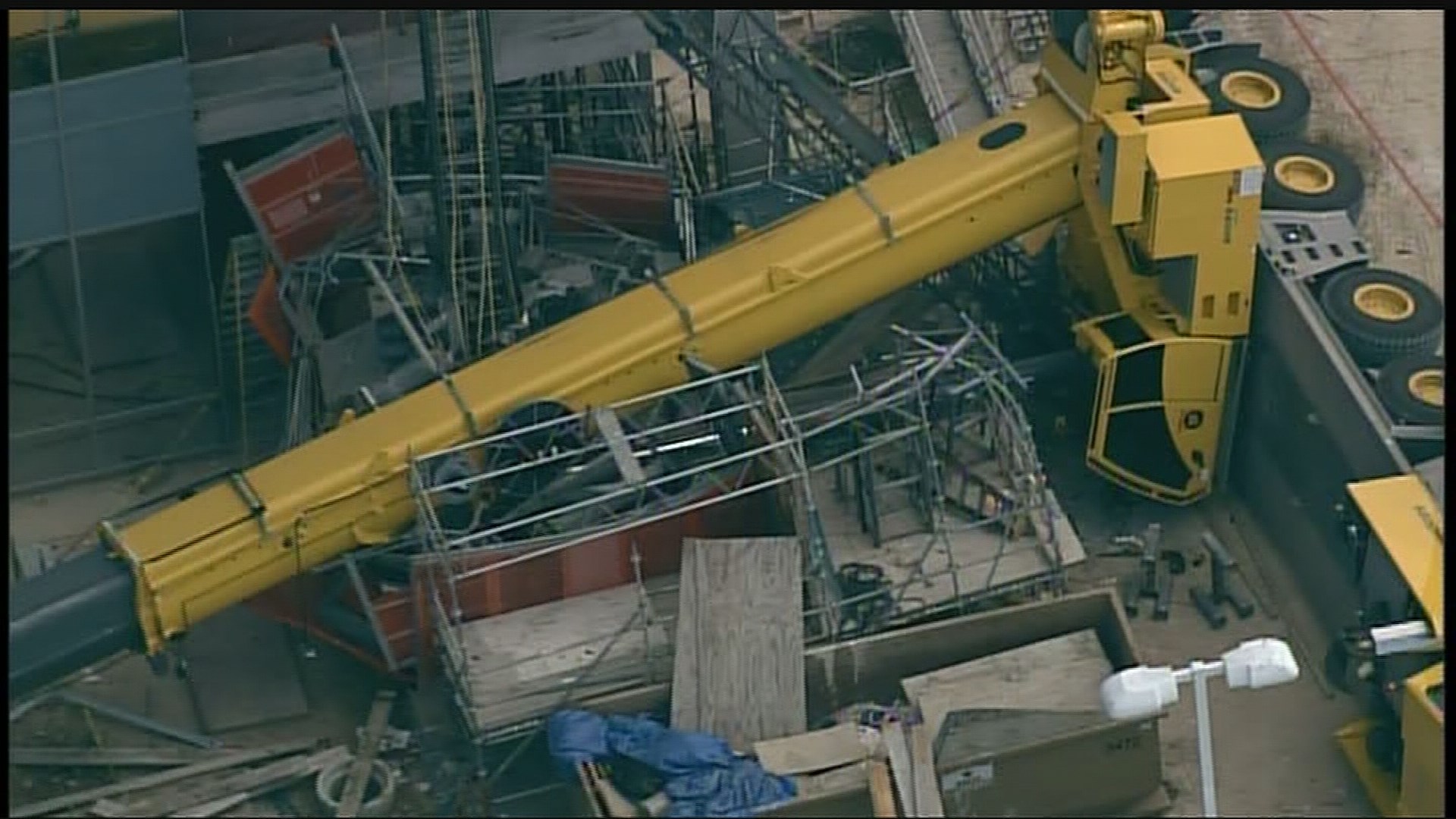 Crane topples over next to McGill Toyota | khou.com