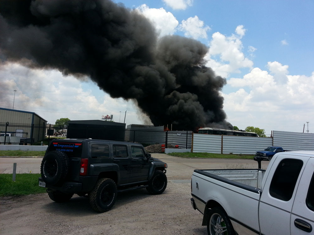 Scrap yard fire burns several wrecked cars in SW Houston | khou.com