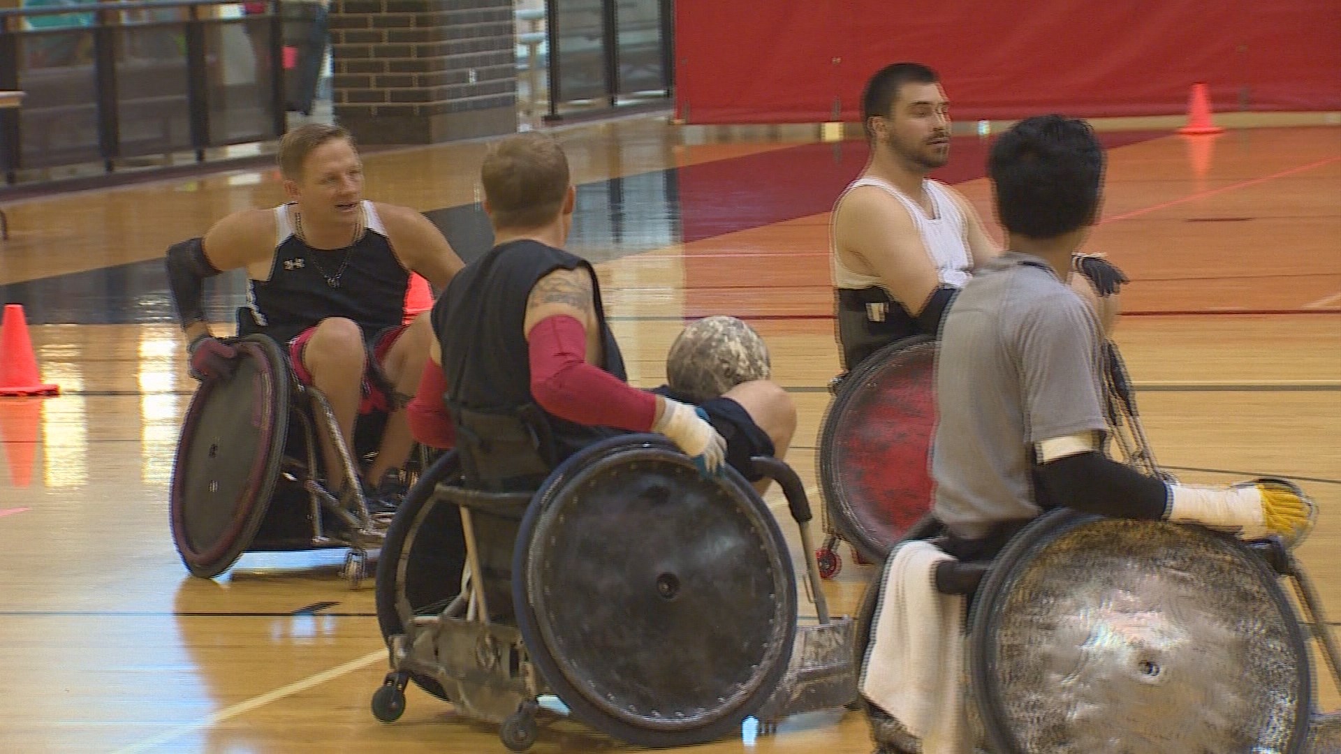 Adaptive athletes take on "murderball" during UH camp | khou.com