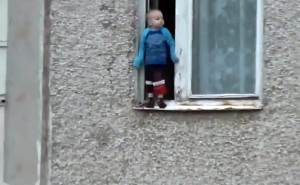Video: Toddler hangs out 8th floor window, parents nowhere to be seen ...