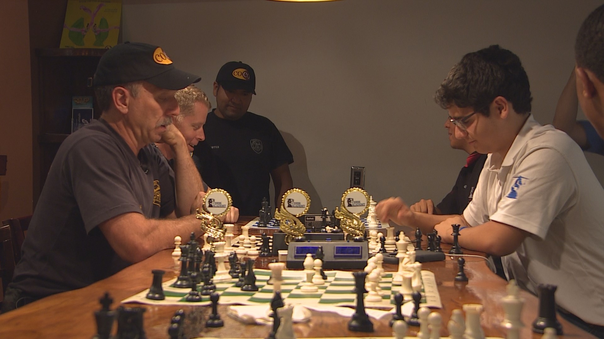 Young chess players challenge Houston firefighters | khou.com
