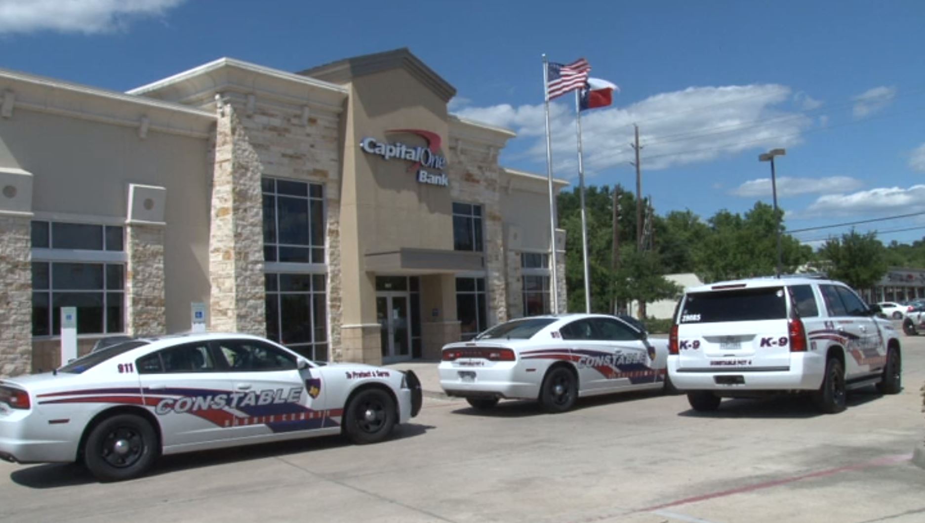 Police: Suspect falls out of getaway vehicle after bank robbery | khou.com