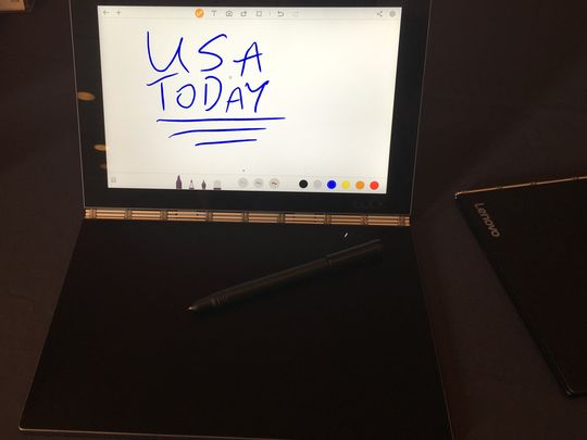 Slender Lenovo Yoga Book tabet lets you write with real ink | khou.com