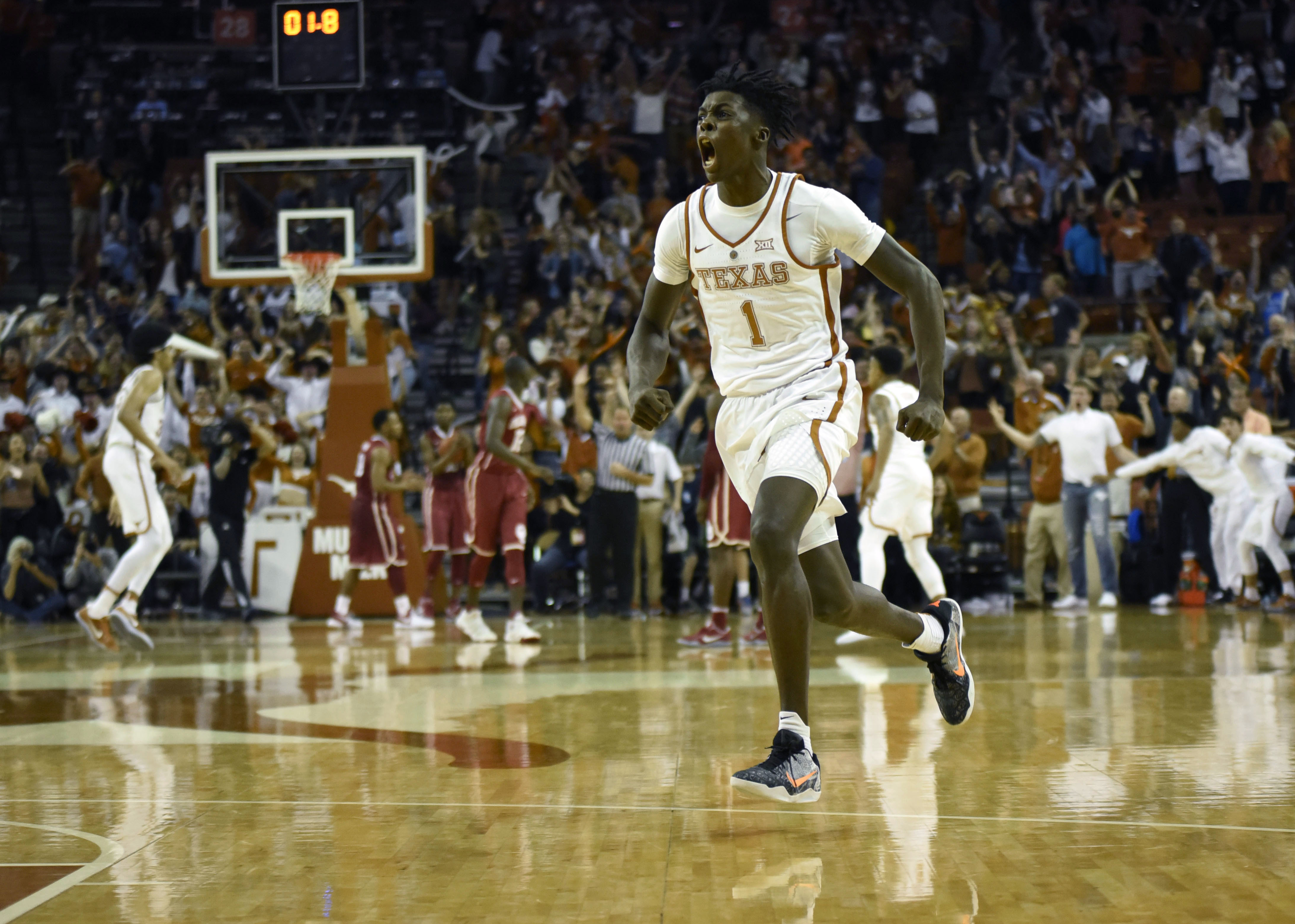 Jones hits 3 with 1.8 left, UT beats OU 84-83 | khou.com